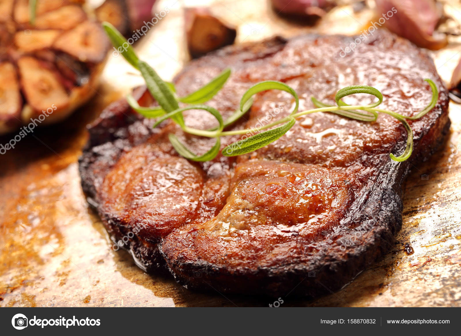 Fried grilled pork neck with garlic on rustic background Stock Photo by ...