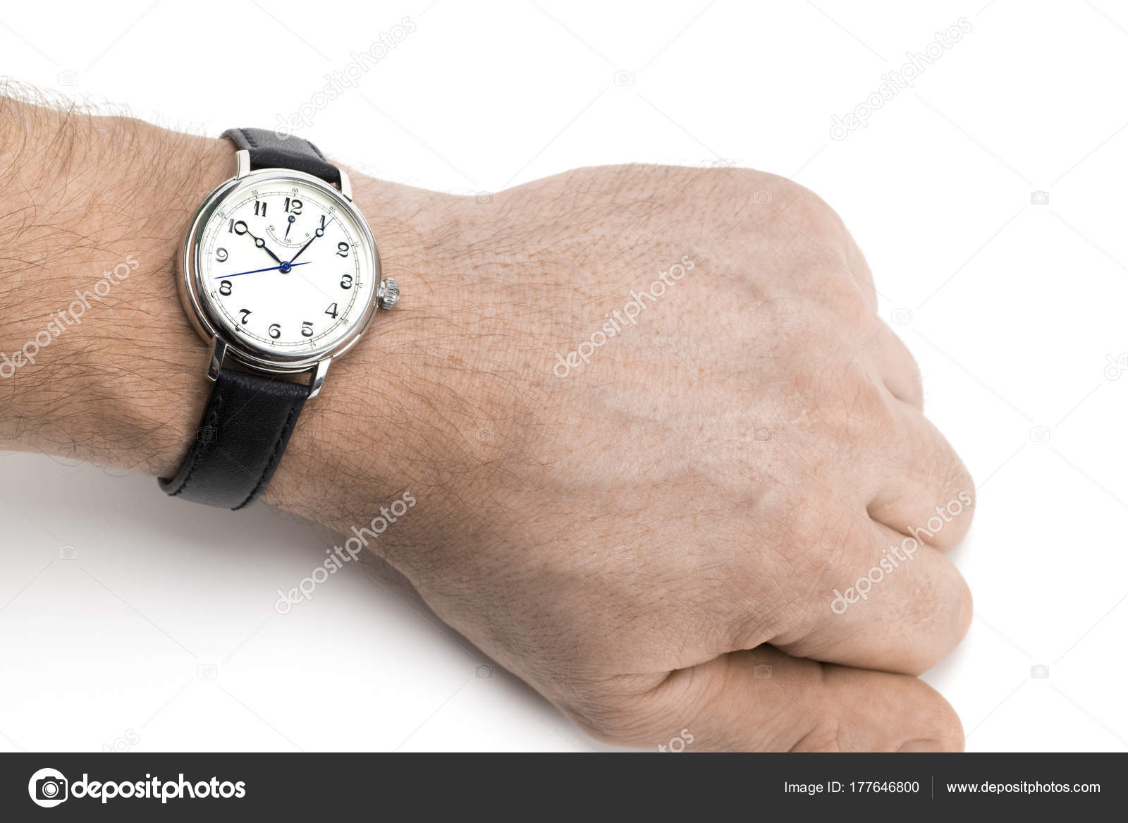 A men wearing a watch with black leather strap over a white back ...