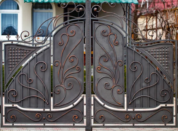 decorative parts of metal gates, elements of hand forging - Stock Image ...