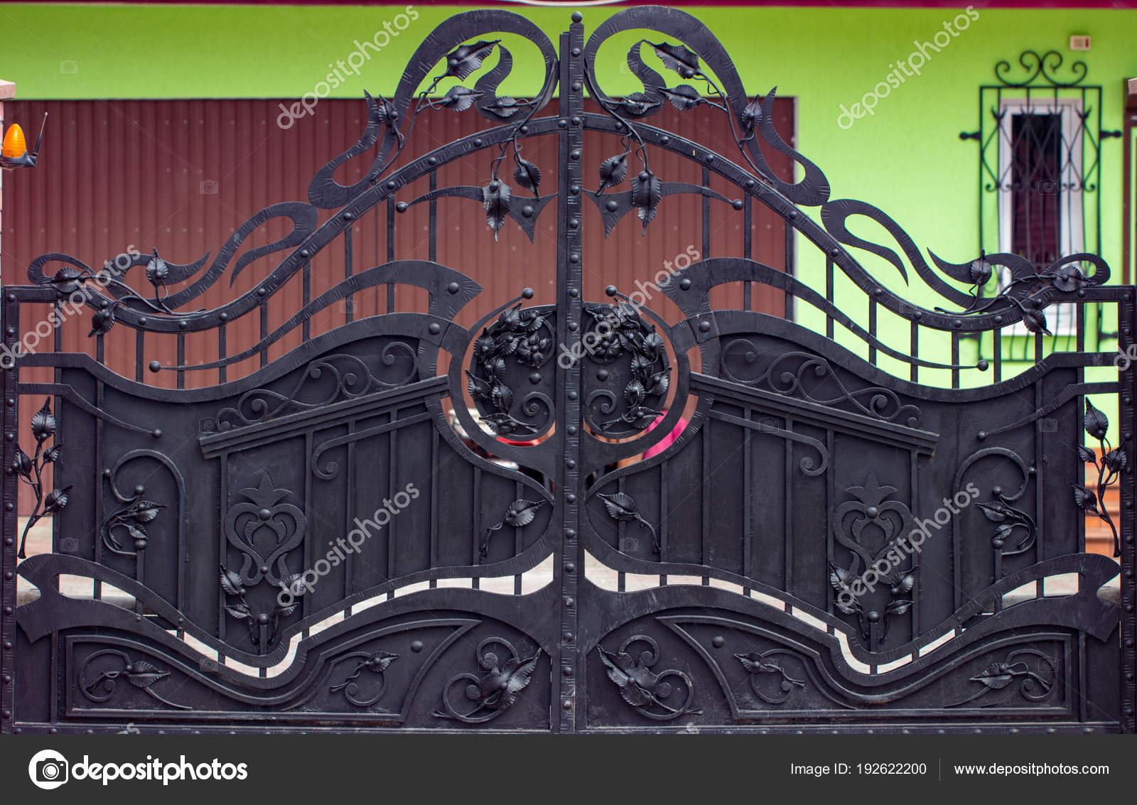 Wrought-iron gates, ornamental forging, forged elements close-up ...