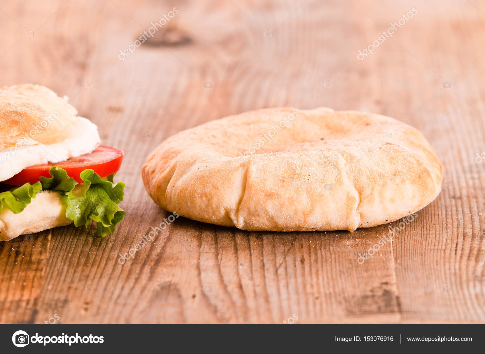 Puccia bread with mozzarella and tomato. Stock Photo by ©milla74 153076916