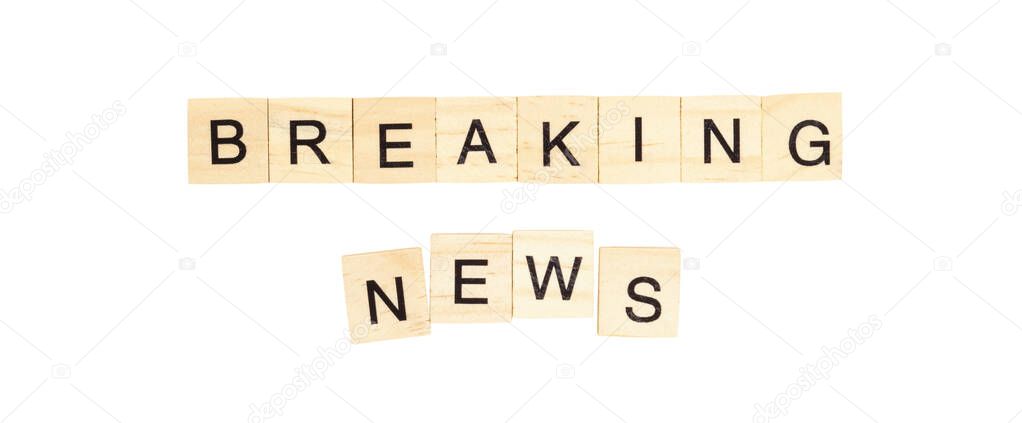 Las palabras "Breaking News" se deletreaban con letras en el fondo ...