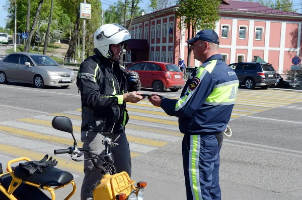 The inspector of traffic police services monitors the route using the ...