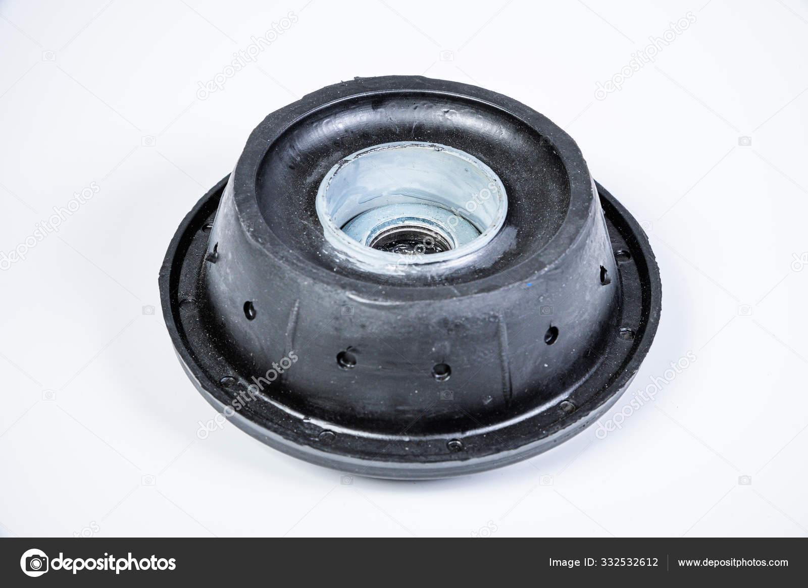 New thrust bearing of front suspension strut of a car on a gray ...