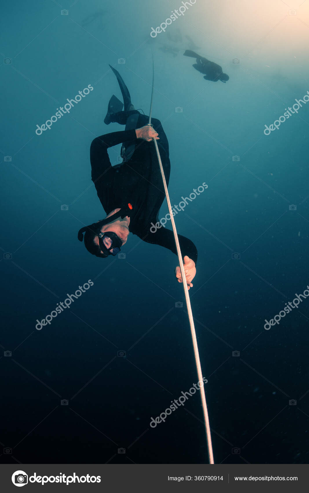 Free Diver Descending Rope Depth — Stock Photo © mihtiander #360790914