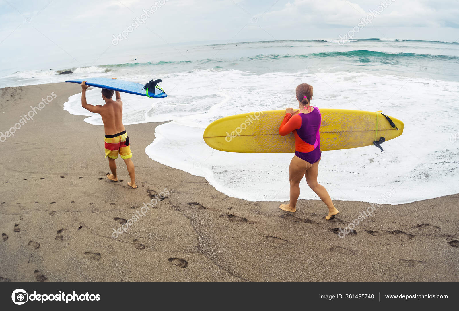 Two Surfers Walking Surf Boards Beach Stock Photo by ©mihtiander 361495740