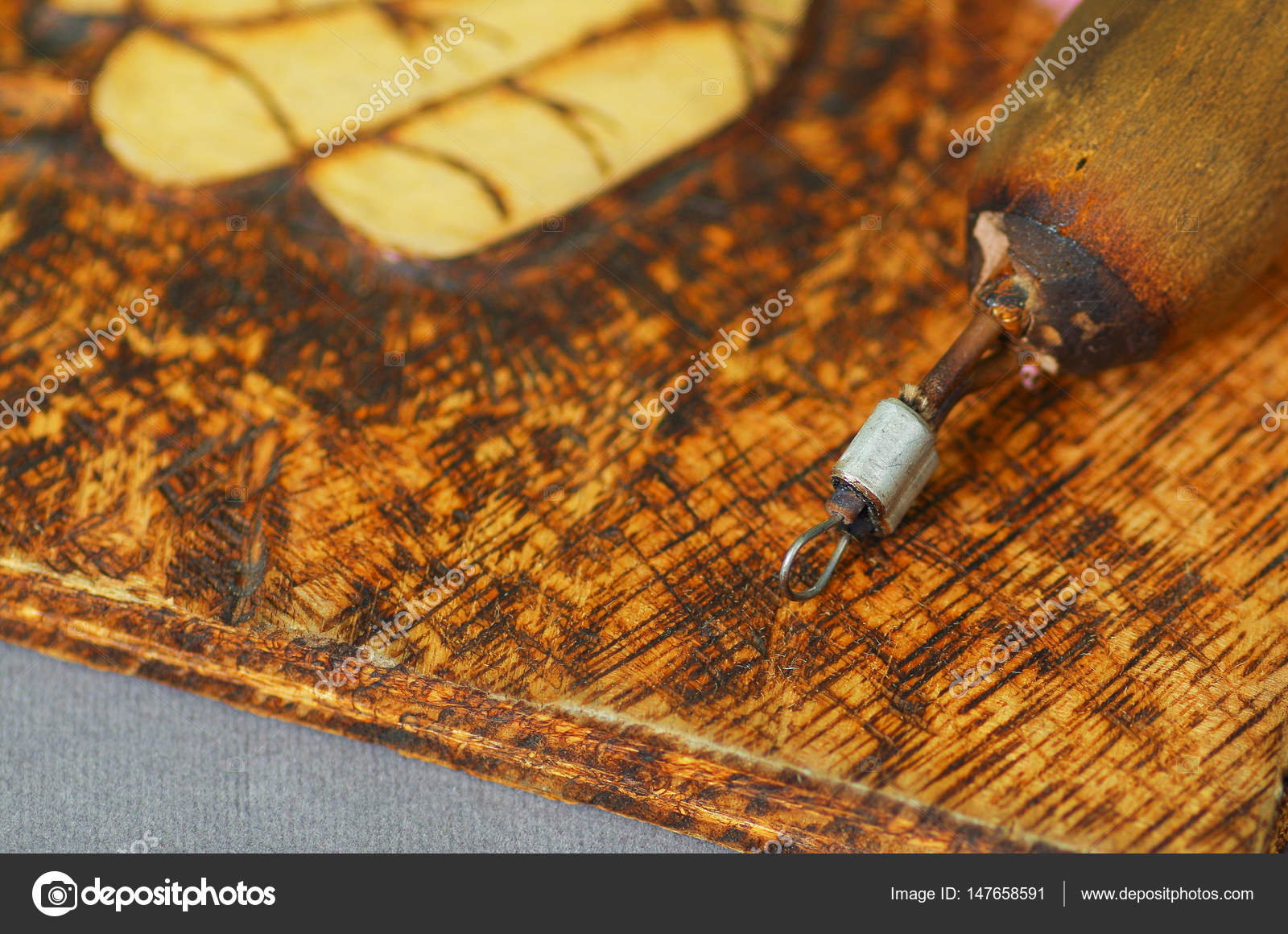 Pyrography pen over burned wood — Stock Photo © pxhidalgo #147658591