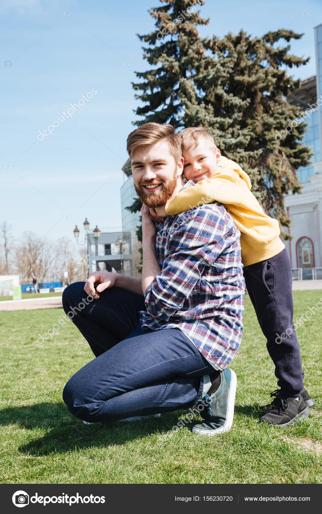 Happy bearded father walking with his little son Stock Photo by ...