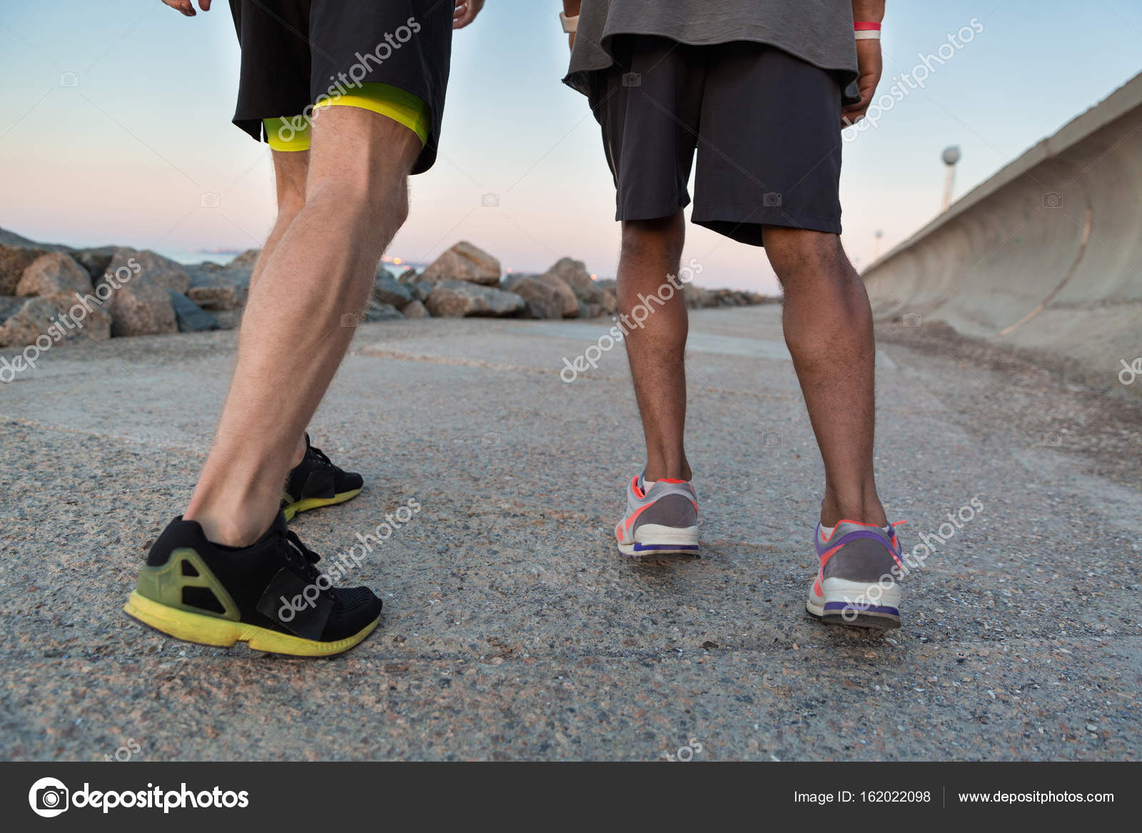 Back view of two male runners in sneakers Stock Photo by ©Vadymvdrobot ...