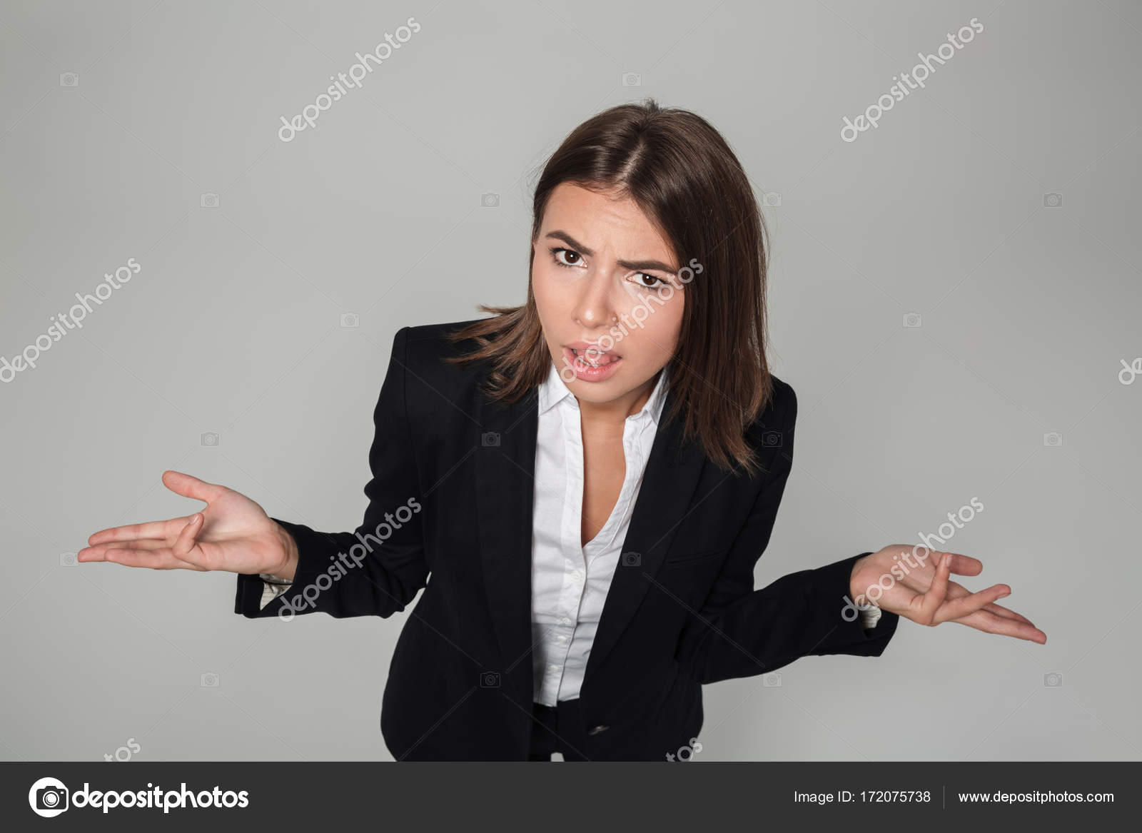 Portrait of a confused frustrated businesswoman Stock Photo by ...