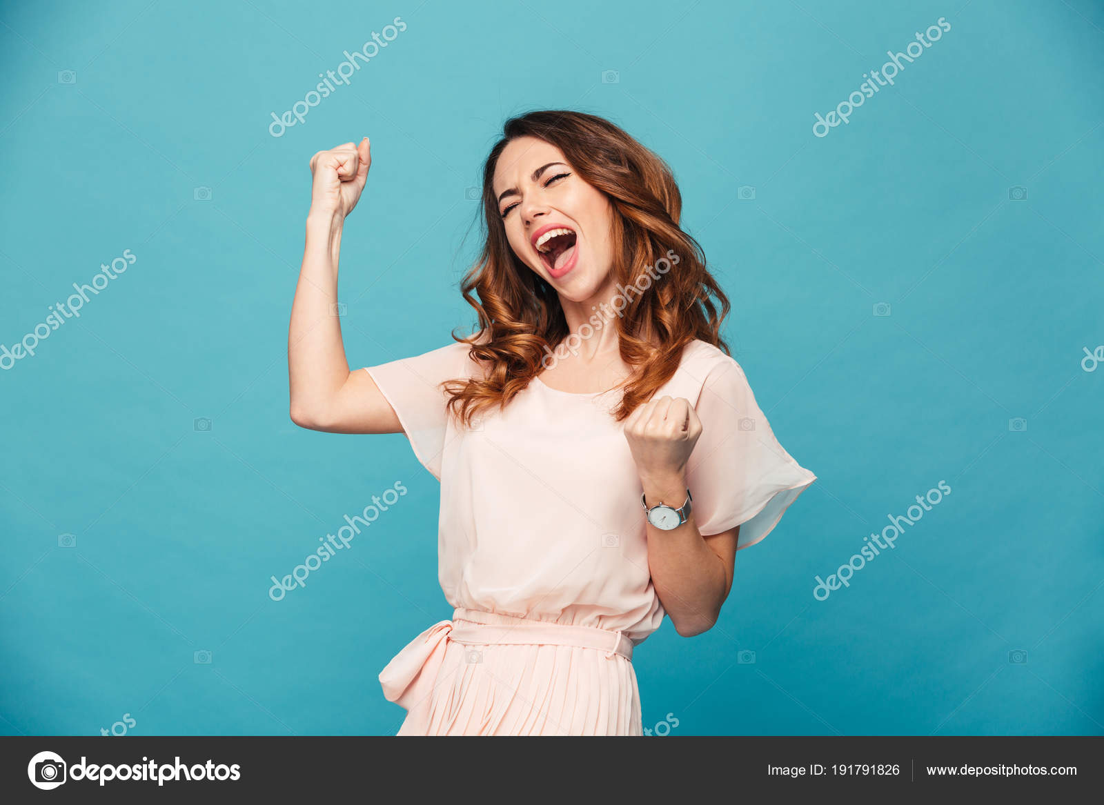 Excited young lady standing isolated — Stock Photo © Vadymvdrobot ...