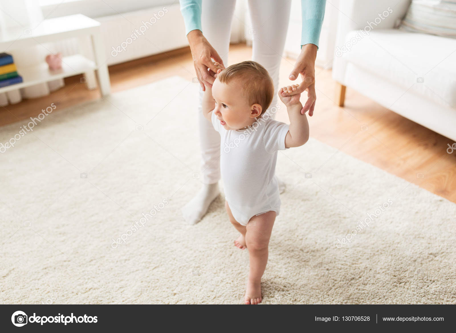 Happy baby learning to walk with mother help Stock Photo by ©Syda ...