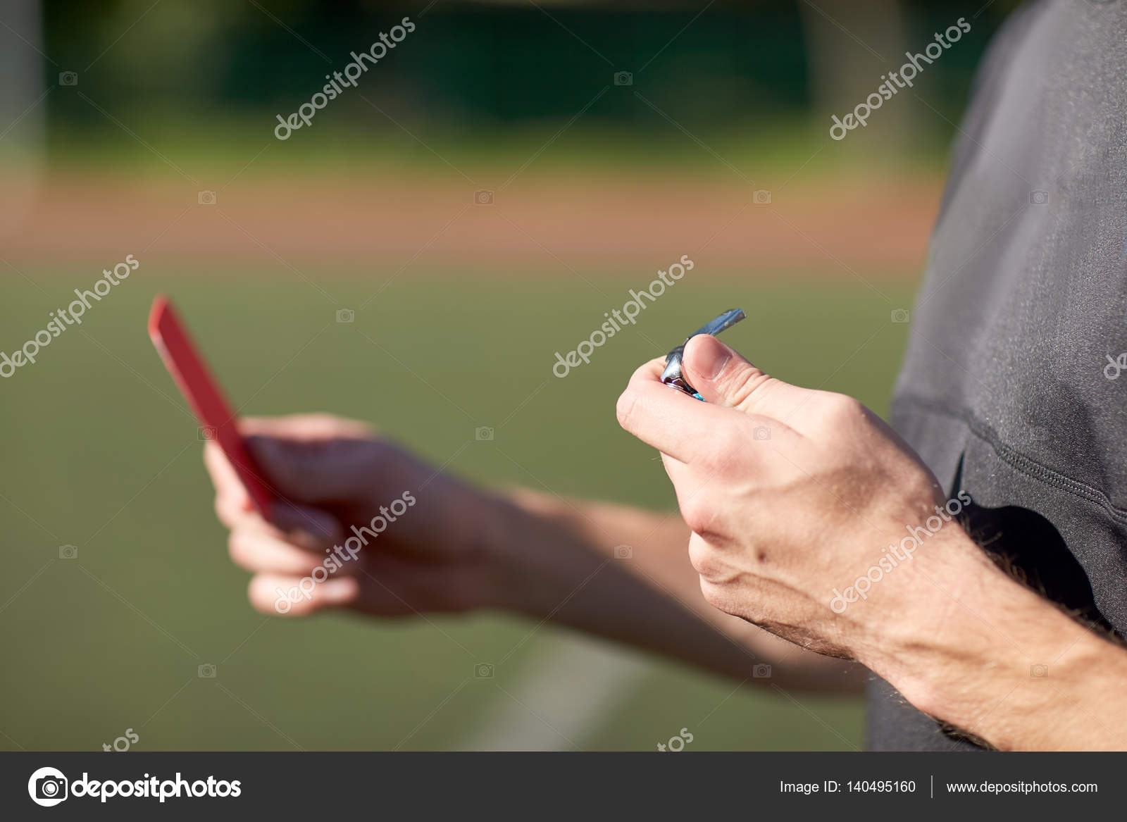 Referee hands with red card on football field Stock Photo by ©Syda ...