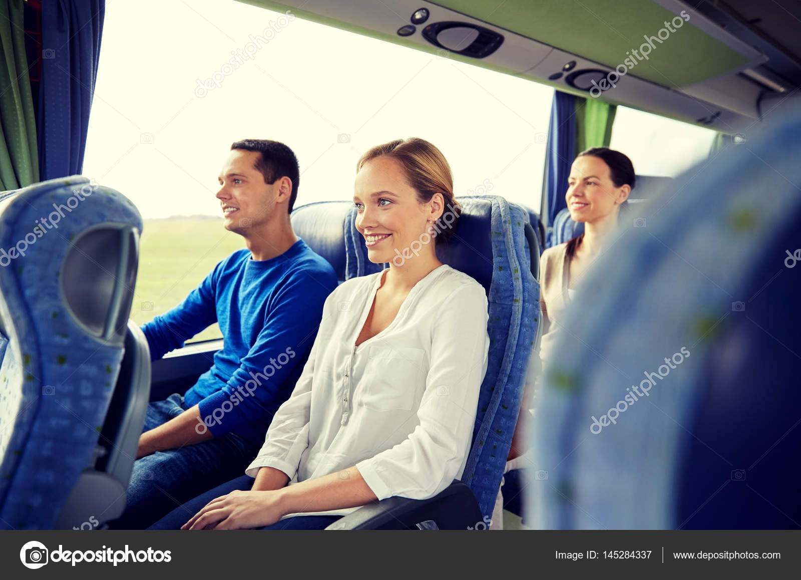 Group of happy passengers in travel bus — Stock Photo © Syda ...