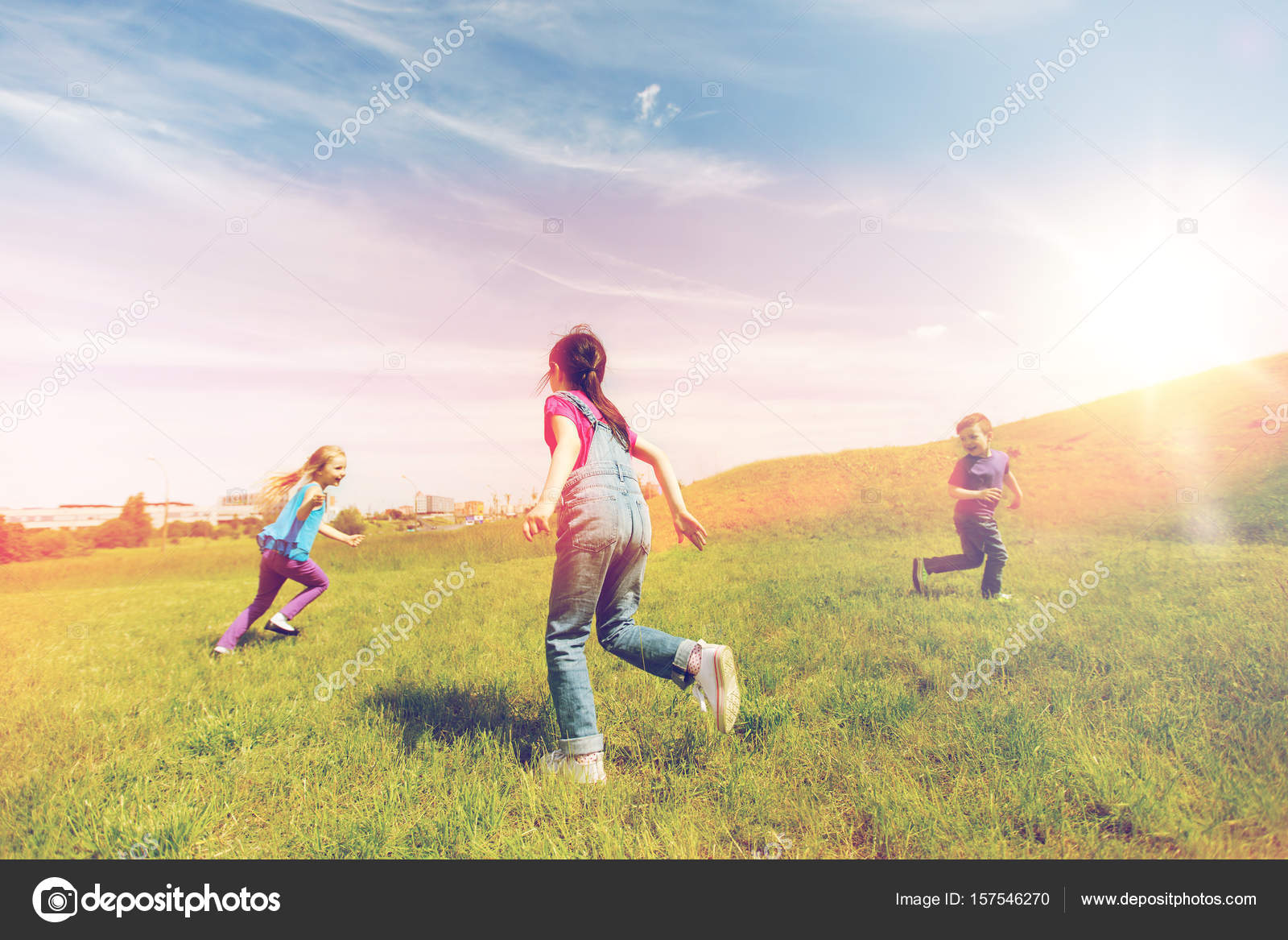 Group of happy kids running outdoors — Stock Photo © Syda_Productions ...