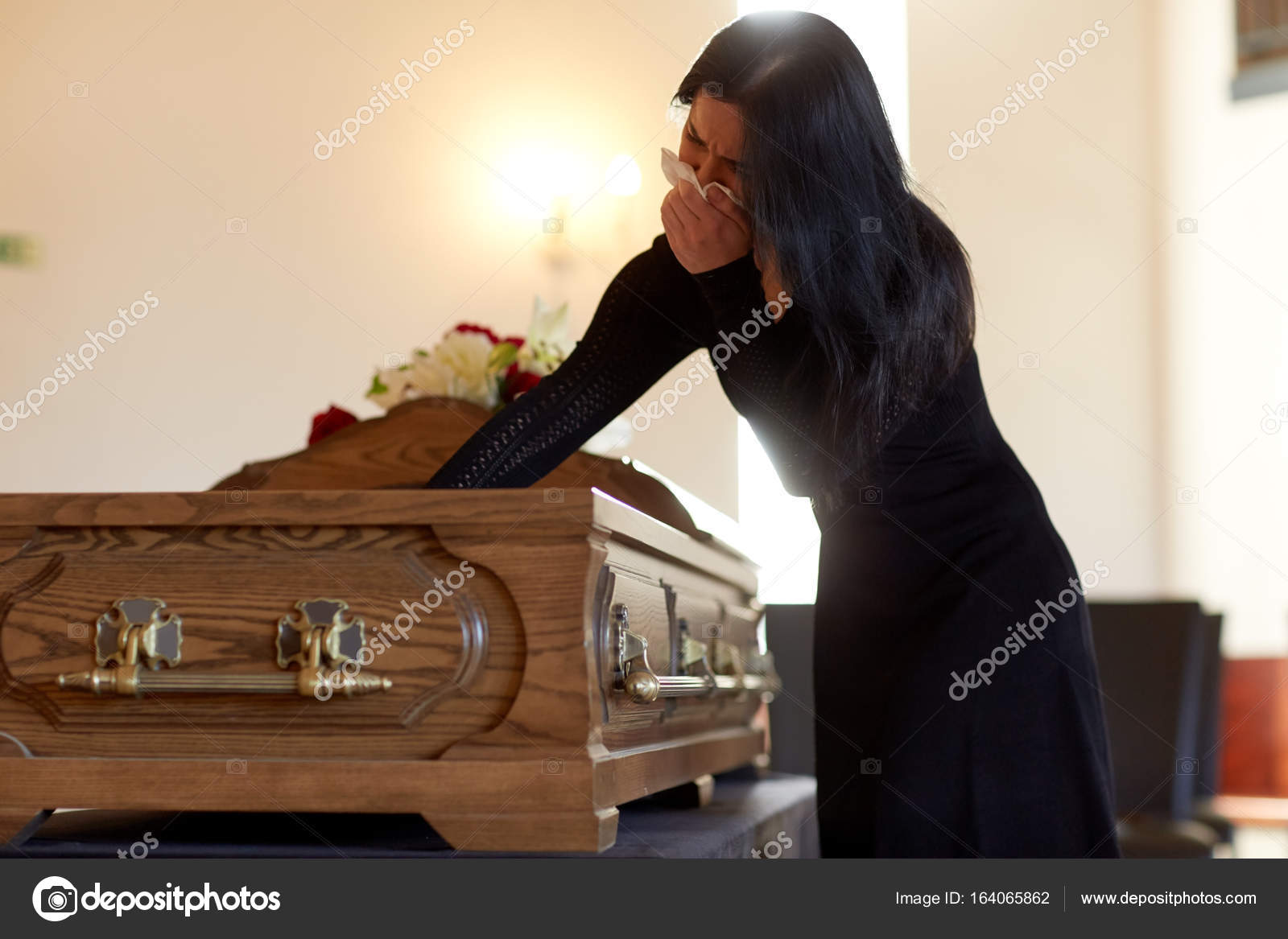 Woman with coffin crying at funeral in church — Stock Photo © Syda ...