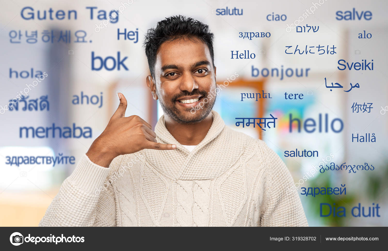 Indian man in sweater making phone call gesture — Stock Photo © Syda ...