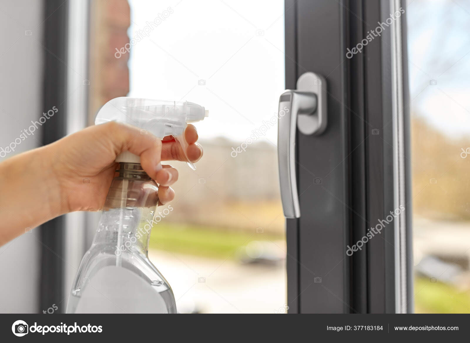 Hands cleaning window handle with detergent — Stock Photo © Syda ...