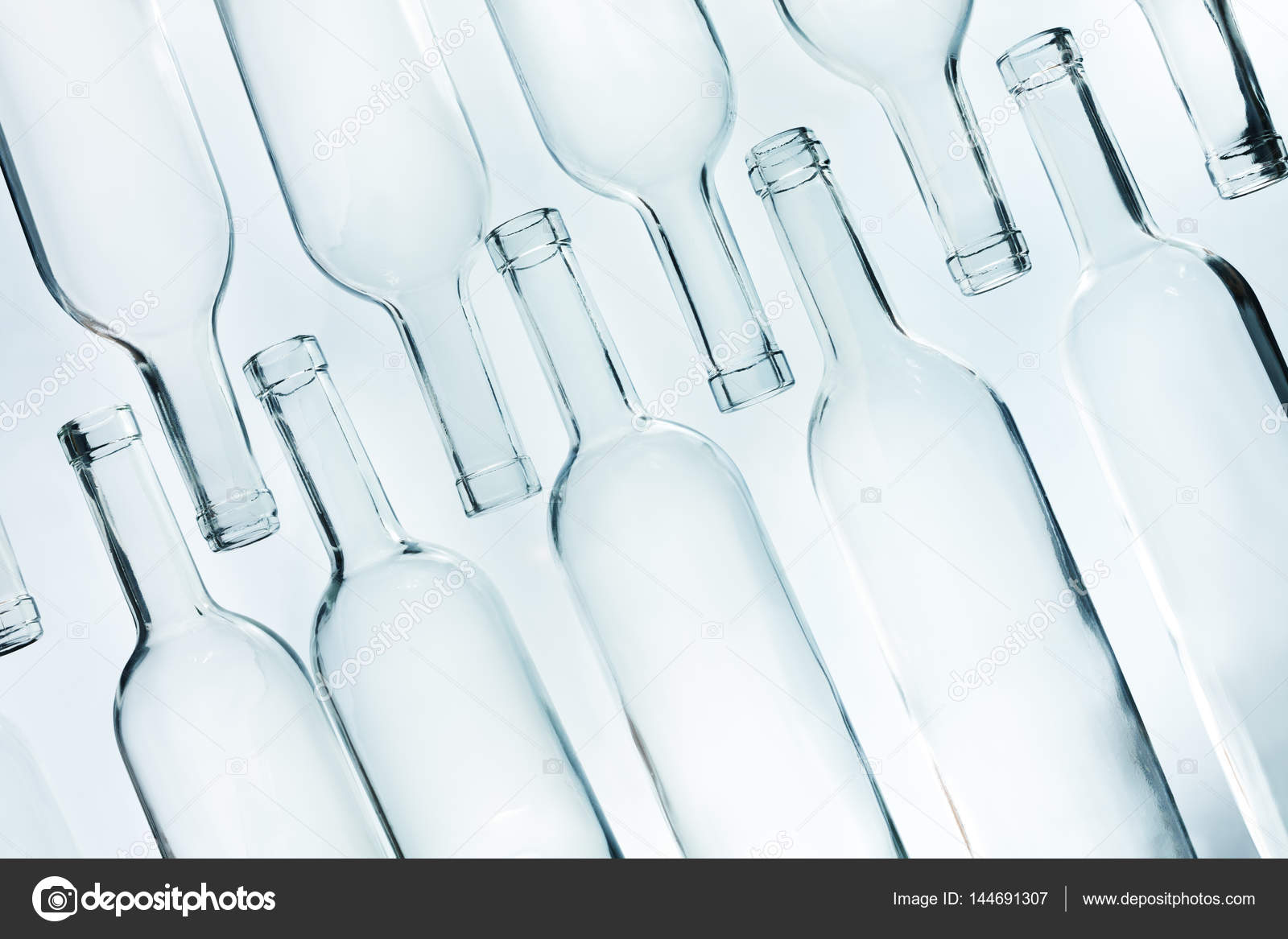 Crystal glass empty bottles laying — Stock Photo © serrnovik #144691307