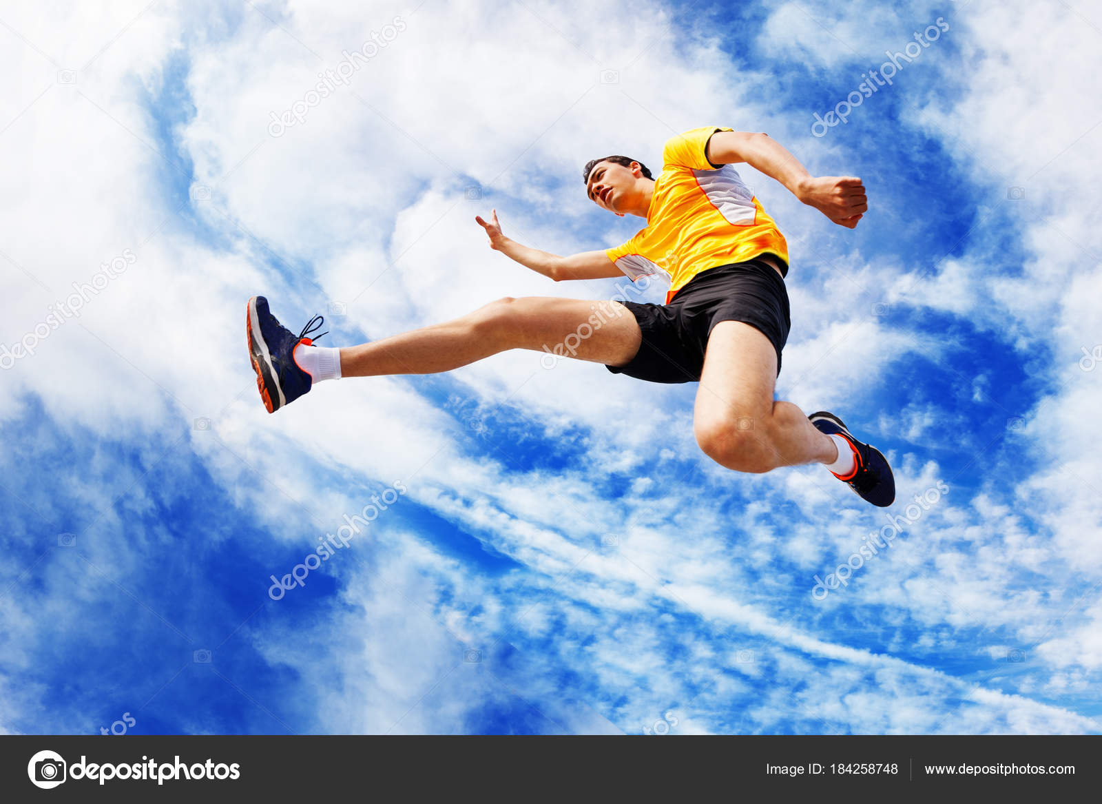 Sportsman Remains Air While Jumping Cloudy Sky Stock Photo by ...