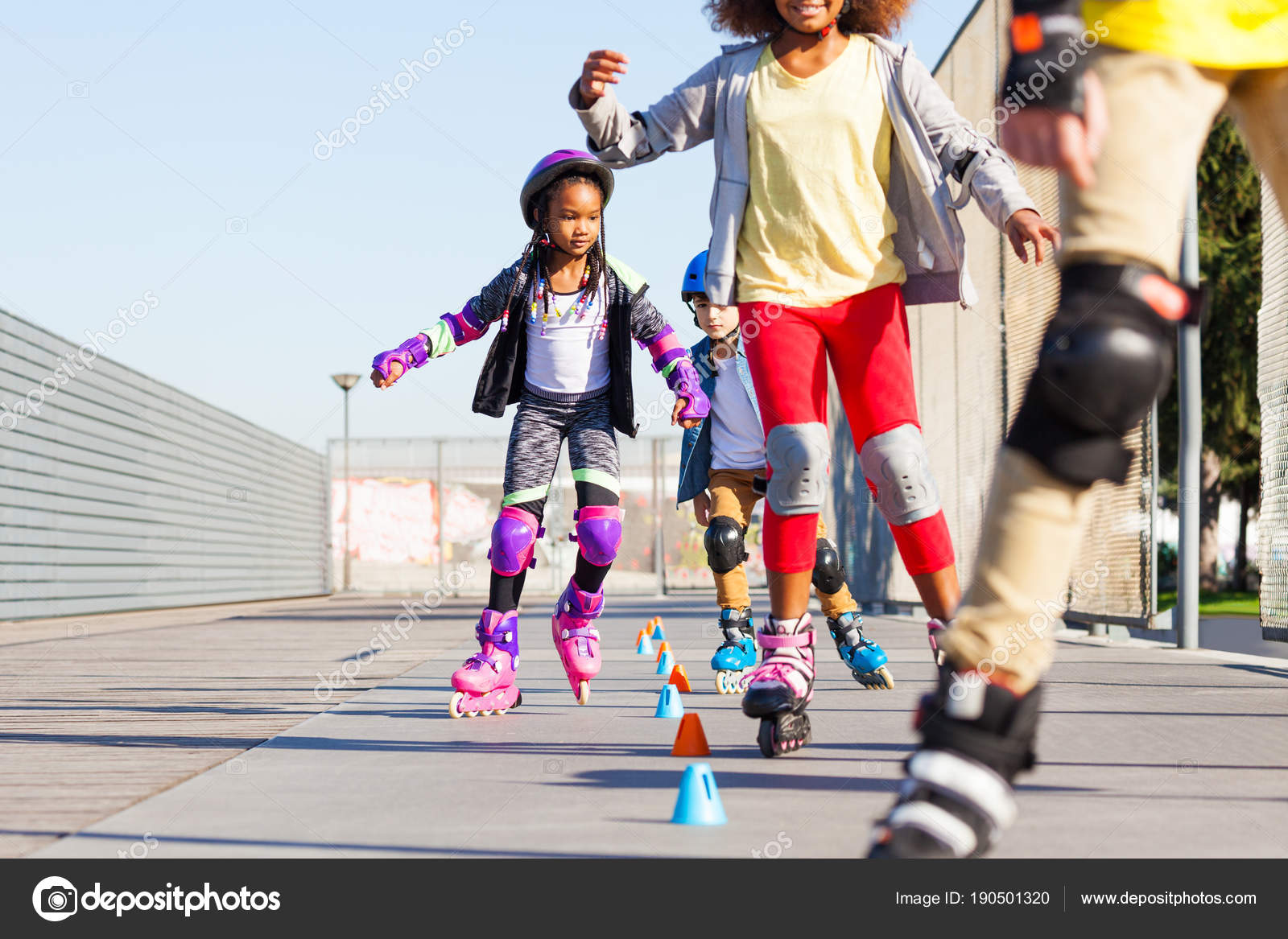 Big Group Multiethnic Kids Learning Slalom Skate Inline Skates Outdoor ...