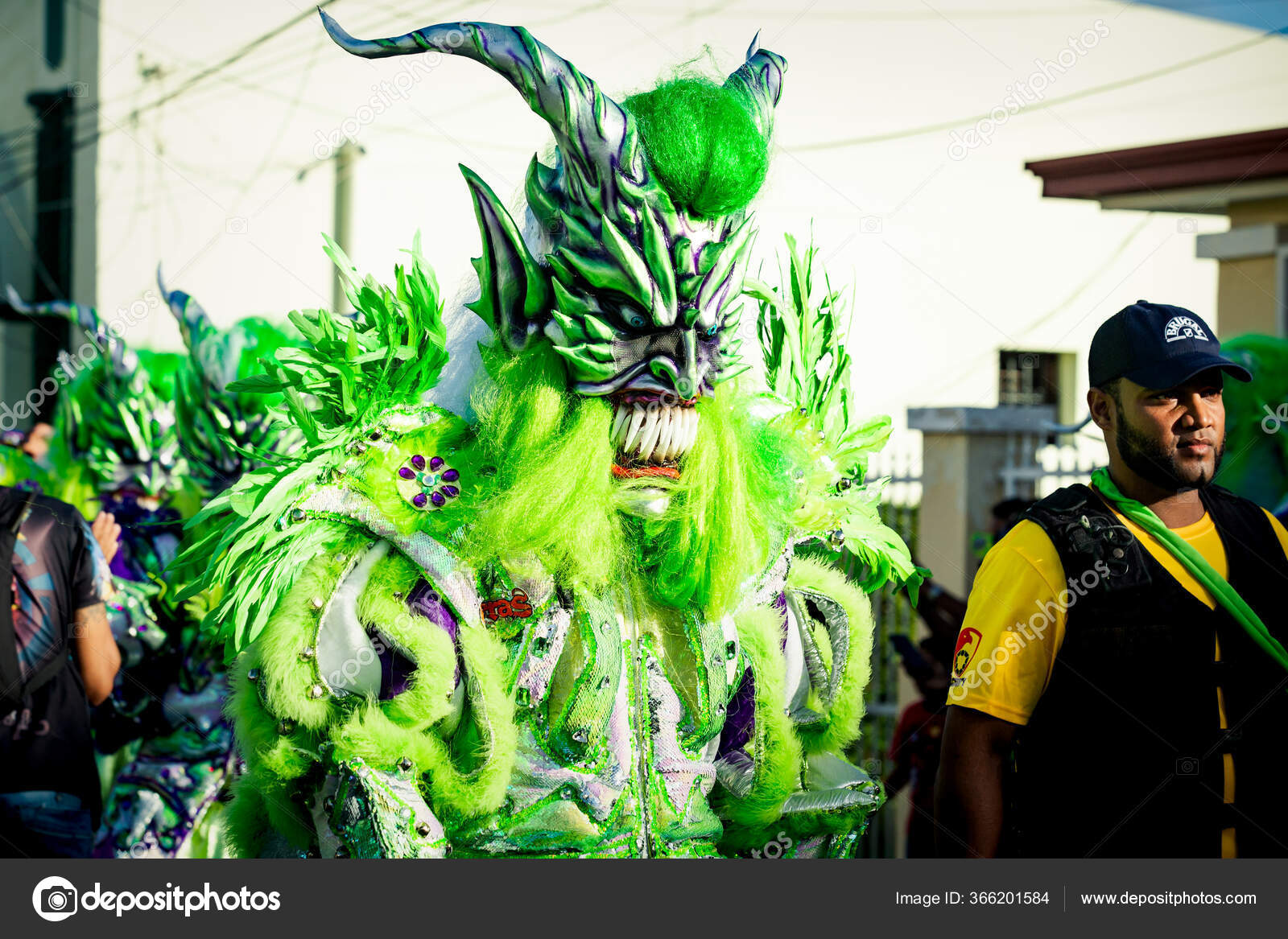 Native man defile in colorful costume at dominican traditional carnival ...