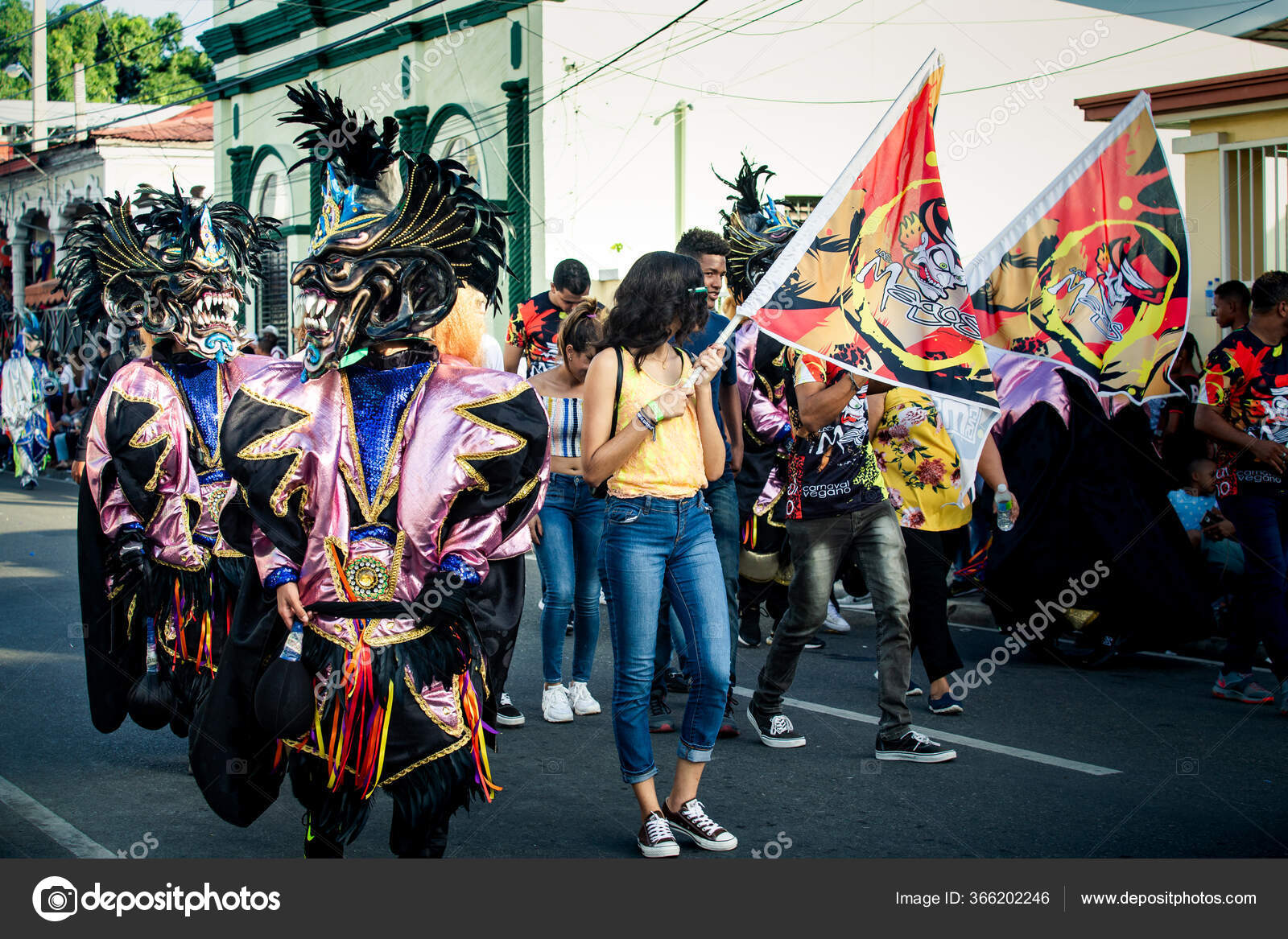 Native man defile in colorful costume at dominican traditional carnival ...