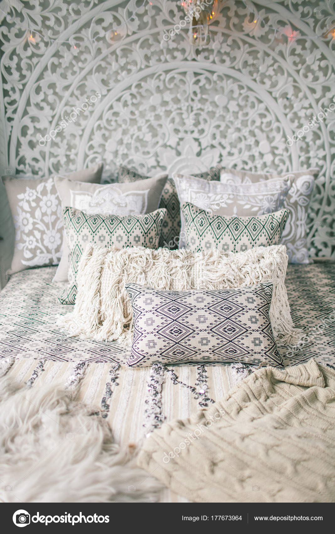 Beautiful pillows made by hands on the bed. Moroccan and Balines ...