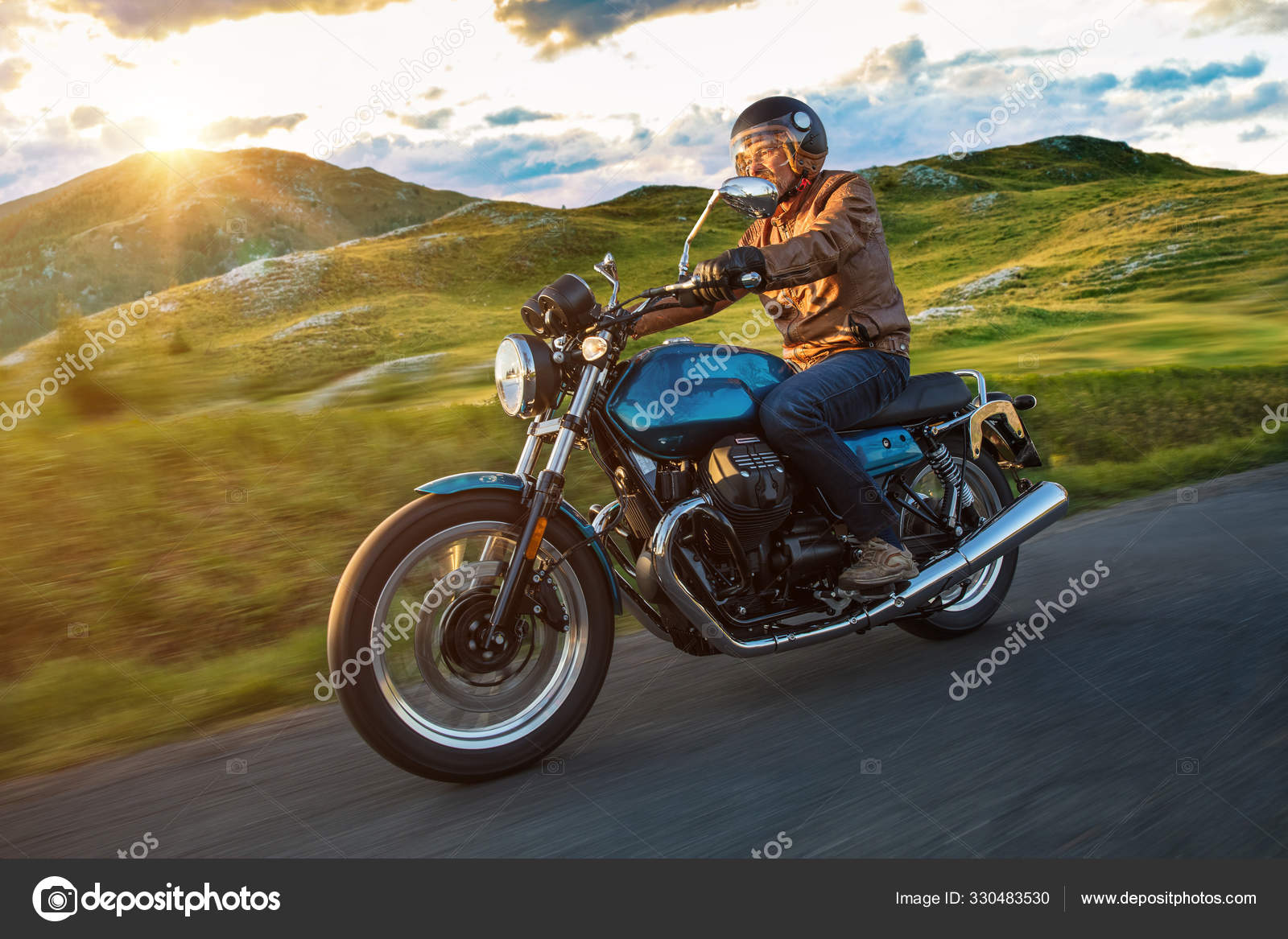 Motorcycle driver riding in Dolomite pass, Italy, Europe. Stock Photo ...