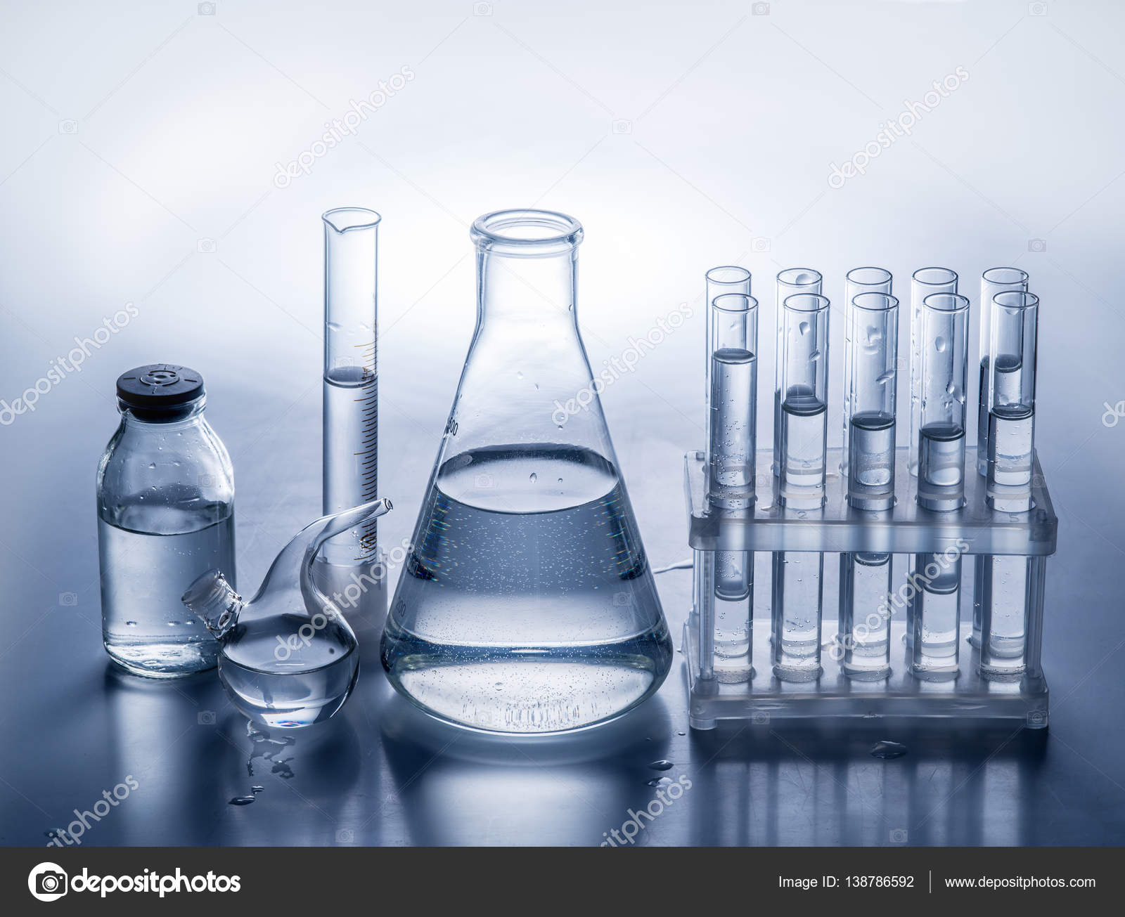 Different laboratory beakers and glassware. Stock Photo by ©Valentyn ...