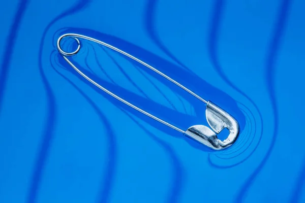 Physical experiment - pin floating on water surface. — Stock Photo ...