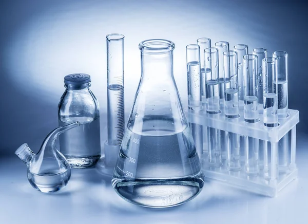 Different laboratory beakers and glassware. Stock Photo by ©Valentyn ...