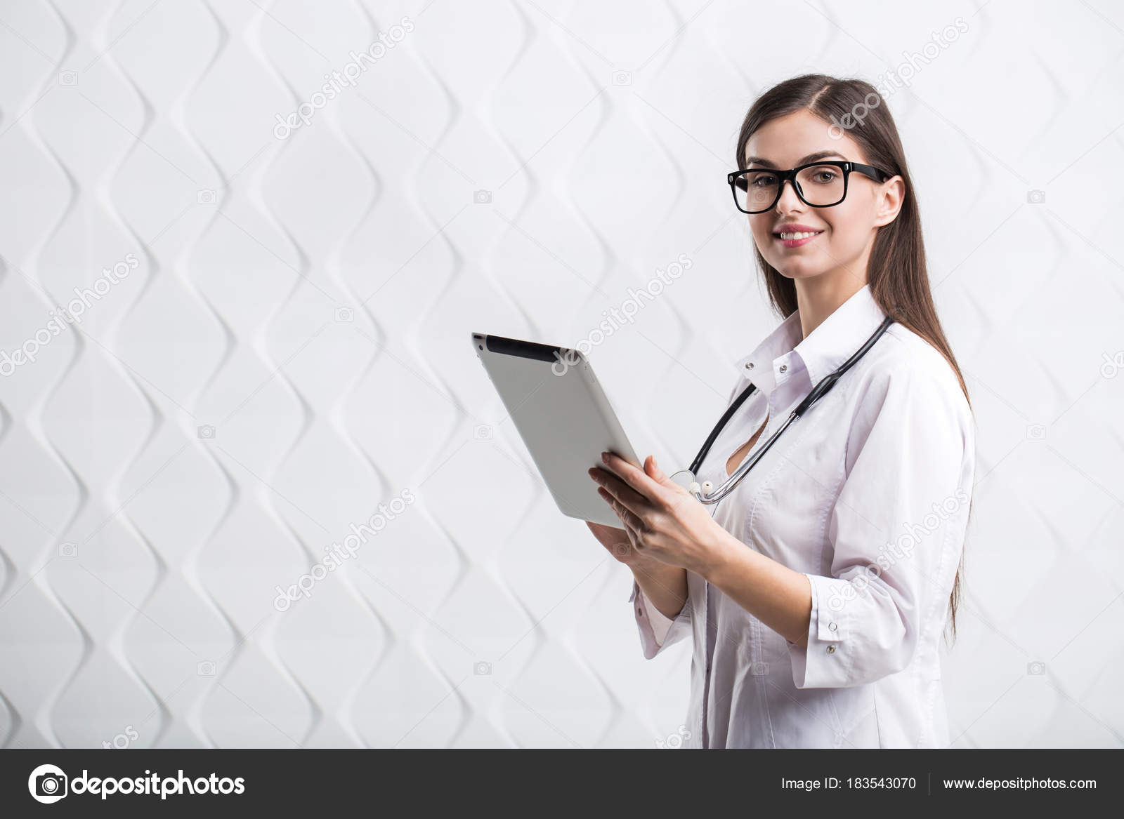 Doctor Using Tablet Stock Photo by ©ProImageContent 183543070