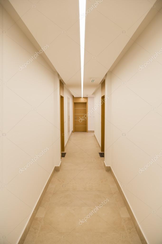 Long corridor in luxury apartment — Stock Photo © boggy22 #126877846