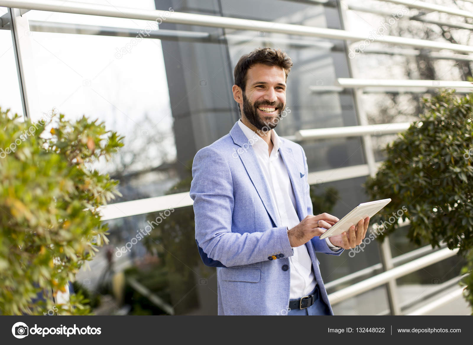 Businessman with digital tablet — Stock Photo © boggy22 #132448022 Businessman with digital tablet — Stock Photo © boggy22 #132448022