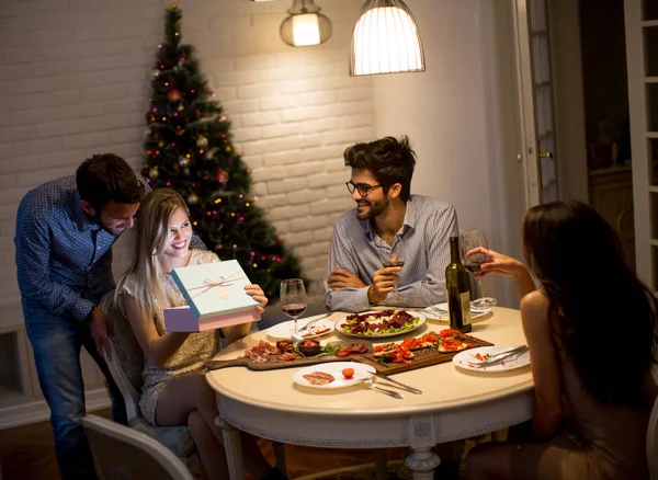 Group of young people celebrating Christmas - Stock Image - Everypixel