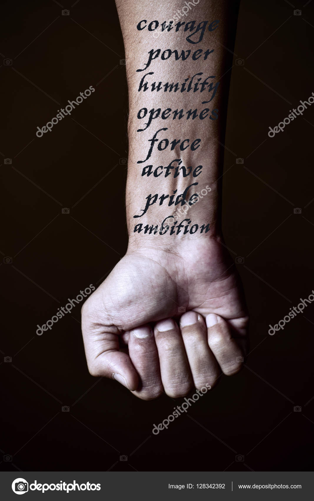 Courage, power and some other words in a forearm Stock Photo by ...