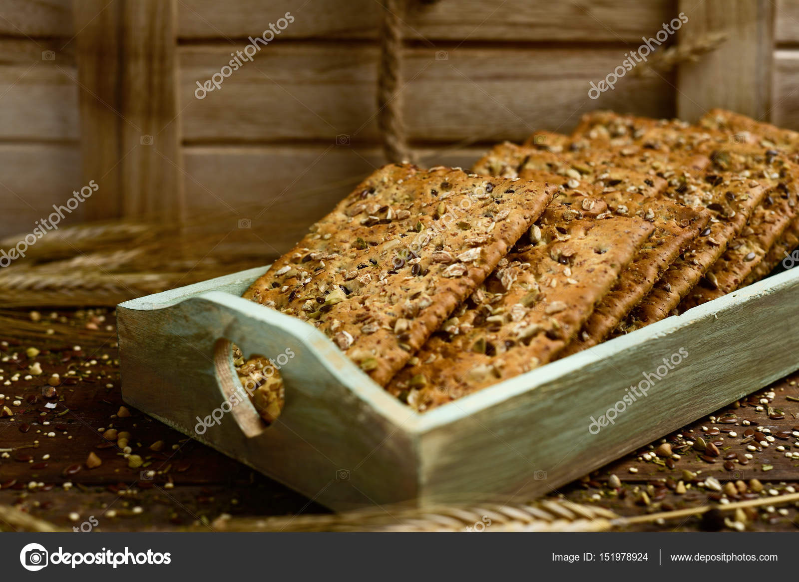 Brown crackers topped with seeds — Stock Photo © nito103 #151978924