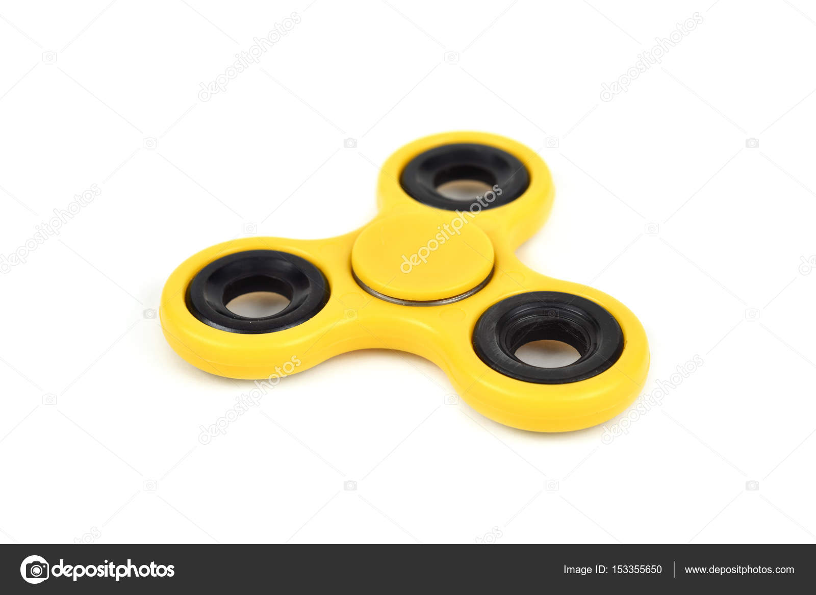 Yellow fidget spinner — Stock Photo © nito103 #153355650