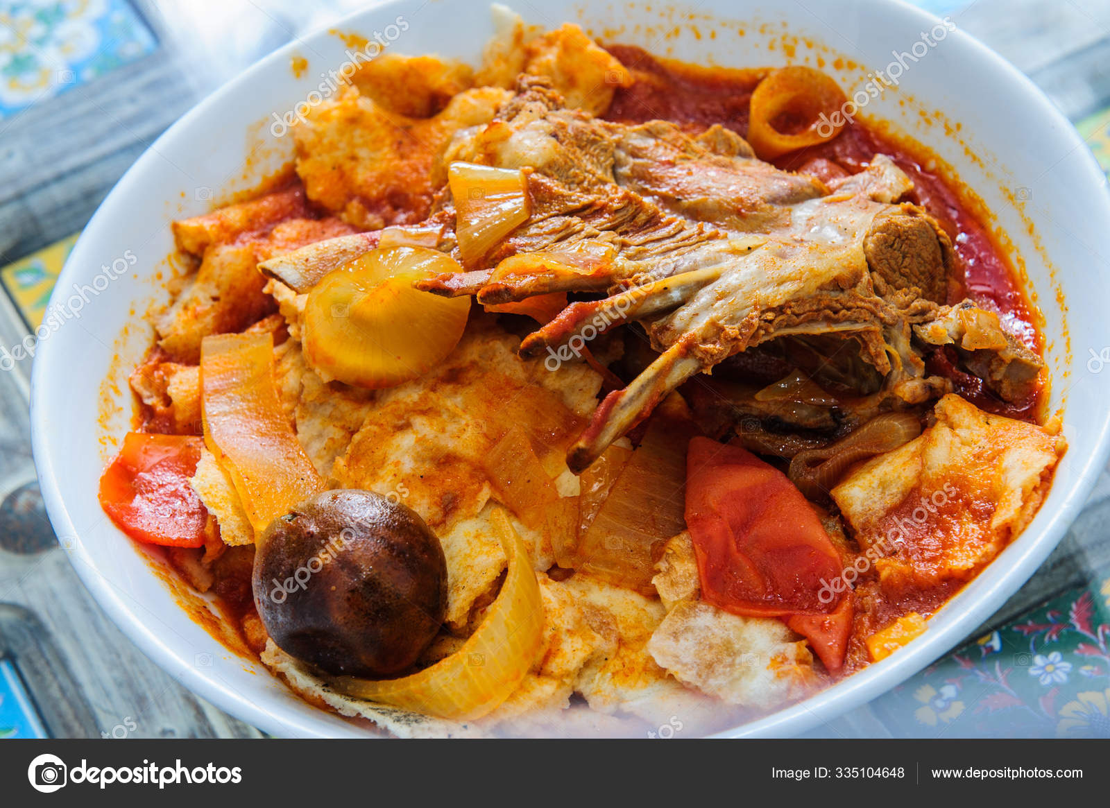 Beef ribs and baked potatoes in the plate,selective focus.Arabic ...
