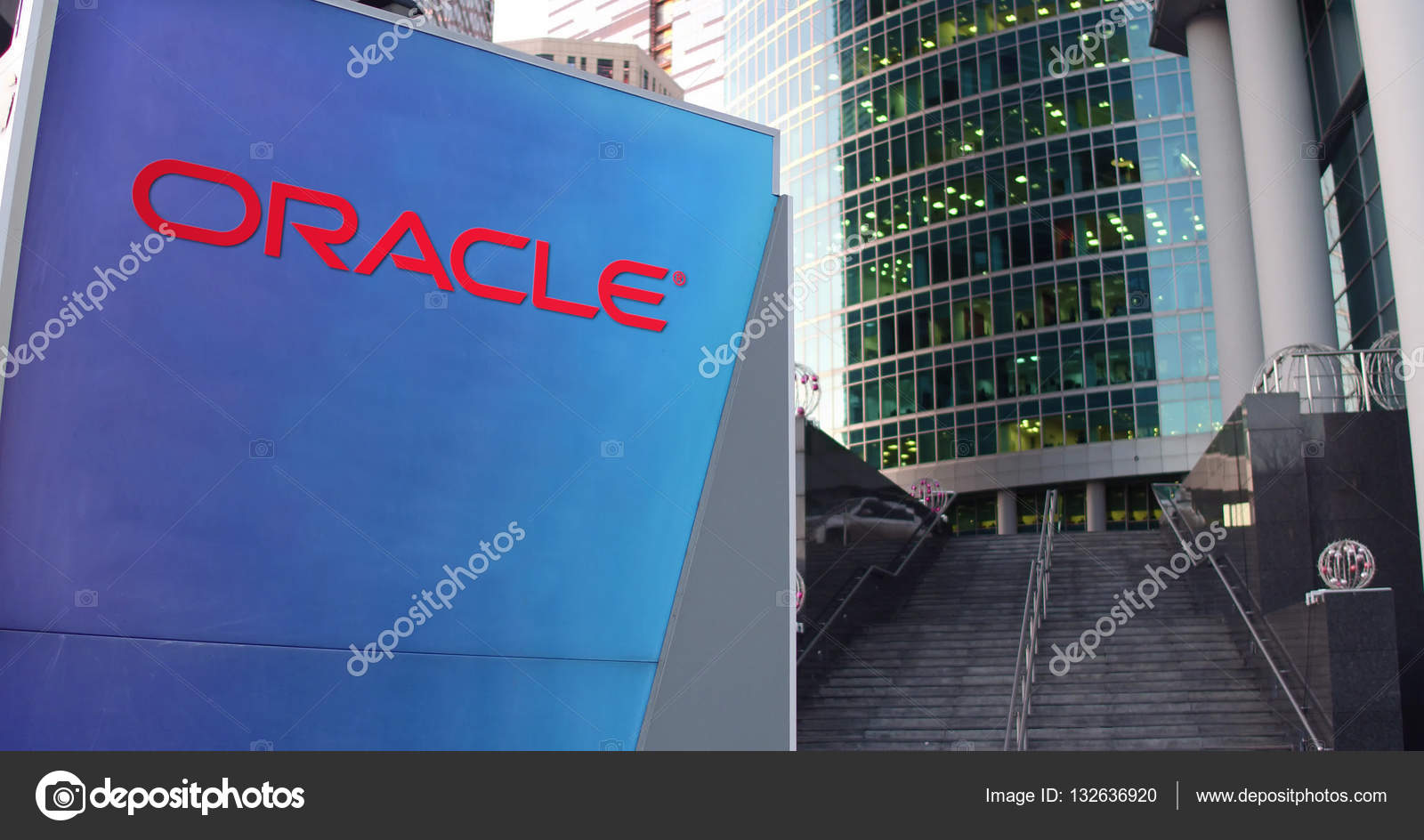 Street signage board with Oracle Corporation logo. Modern office center ...