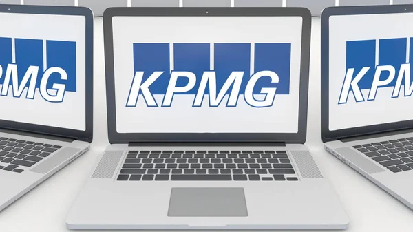 KPMG logo above reception desk in the modern office, editorial ...