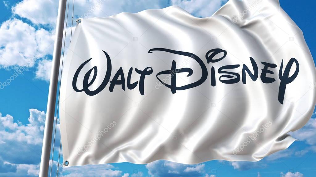 Bandera ondeando con el logotipo de Walt Disney contra el cielo y las ...