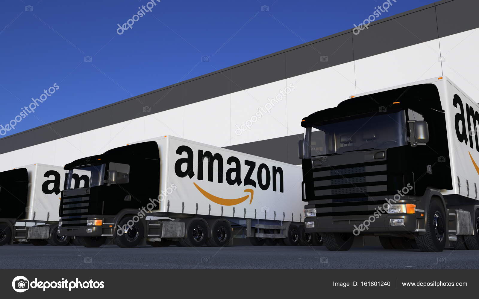 Freight semi trucks with Amazon.com logo loading or unloading at ...