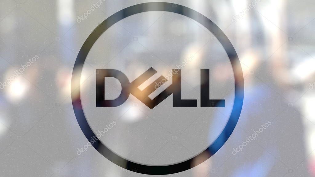 Logotipo de Dell Inc. en un vaso contra la multitud borrosa en el steet ...