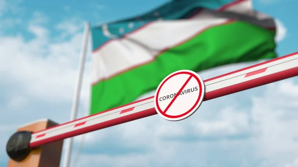 Closing boom barrier with STOP CORONAVIRUS sign against the Kuwaiti ...