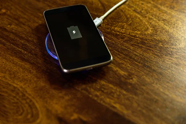 The phone is charging Stock Photos, Royalty Free The phone is charging ...