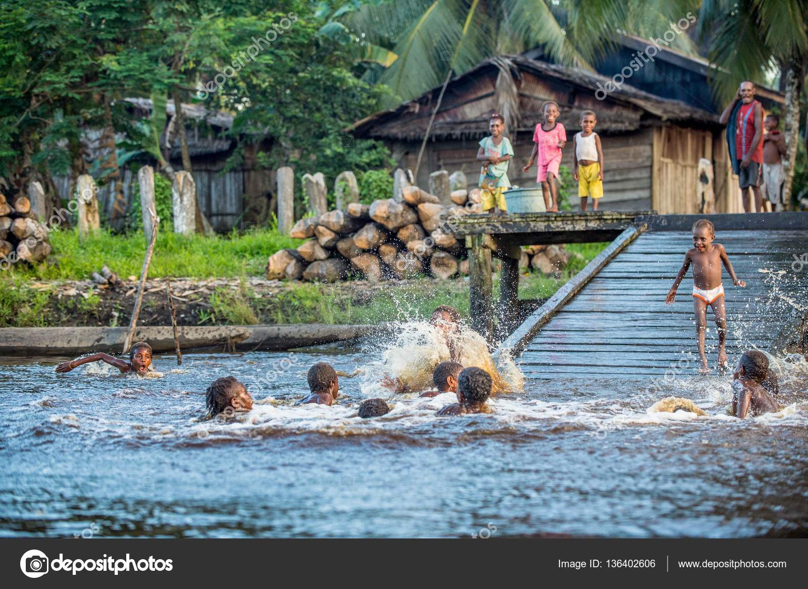Asmat people bathe and swim in river – Stock Editorial Photo © SURZet ...