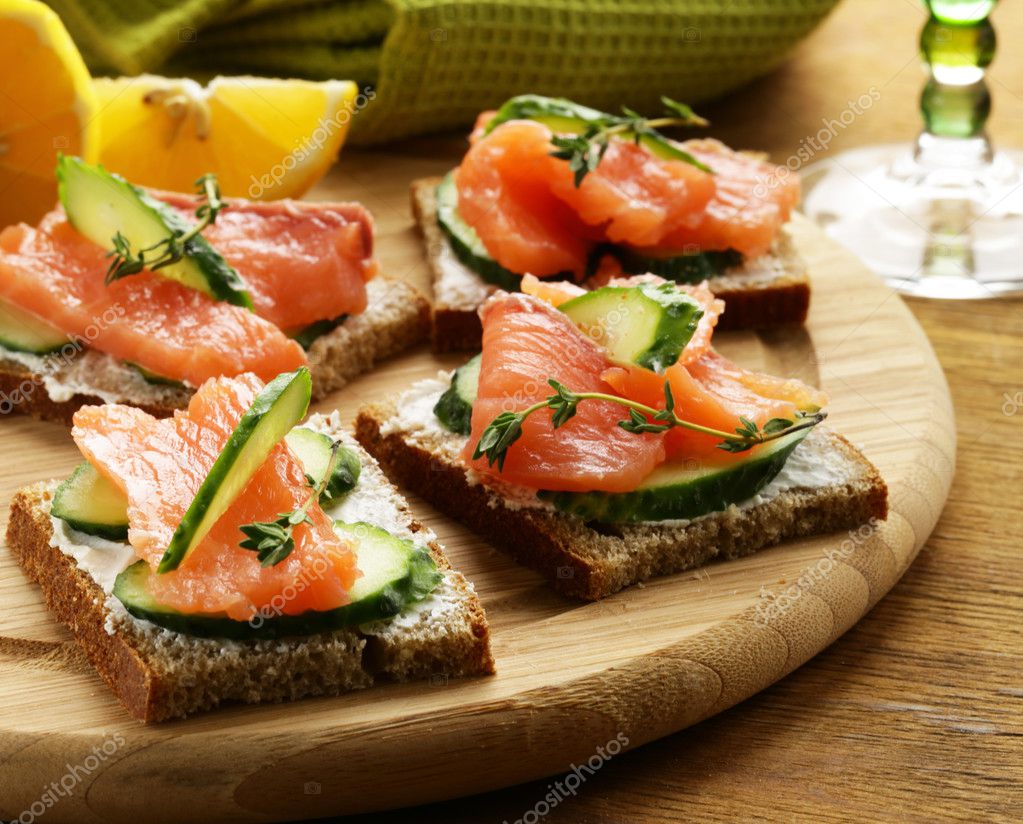 Canape sandwiches with red fish, cucumber and soft cheese Stock Photo ...