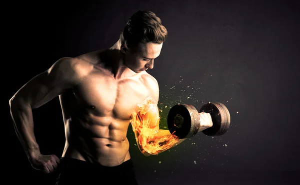Bodybuilder athlete lifting weight with fire explode arm concept Stock ...